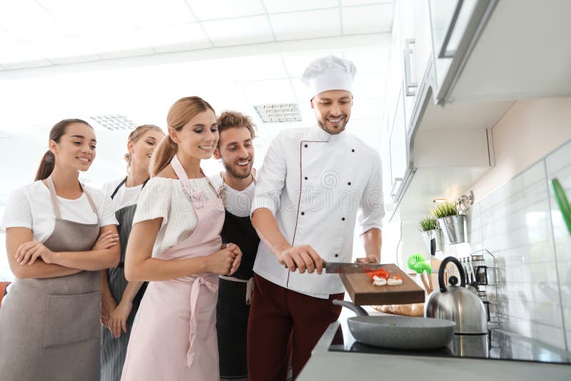 Group of People and Male Chef Stock Image - Image of apprentice, frying ...
