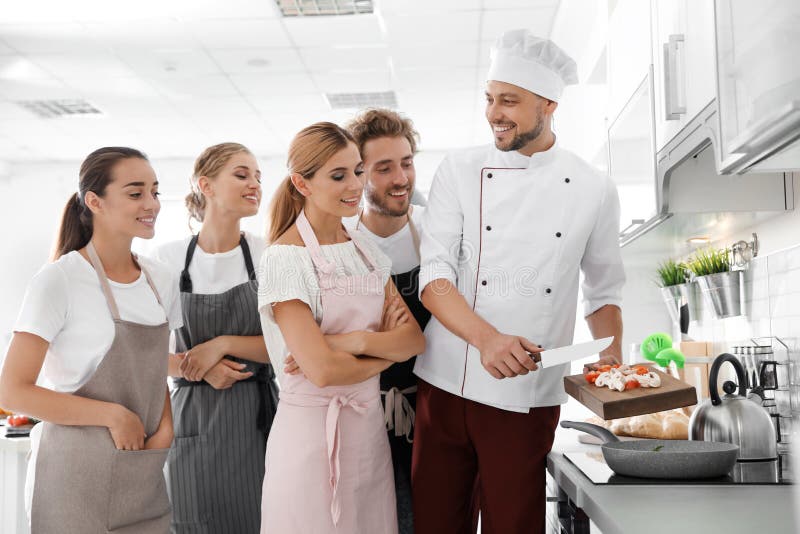 Group of People and Male Chef Stock Photo - Image of caucasian, kitchen ...