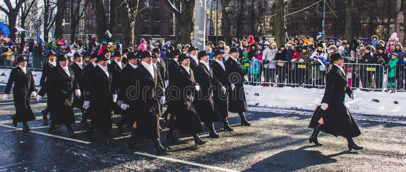 Group Of People March On Road Picture. Image: 111070125