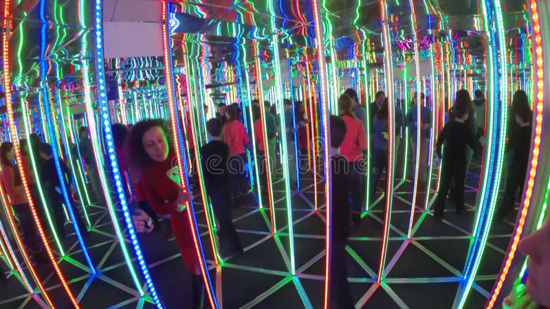 Group of People Move in a Bright Led Maze. Stock Footage - Video of ...