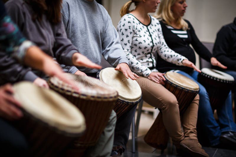 Group of People Playing on Drums Stock Image - Image of beat, fingers ...