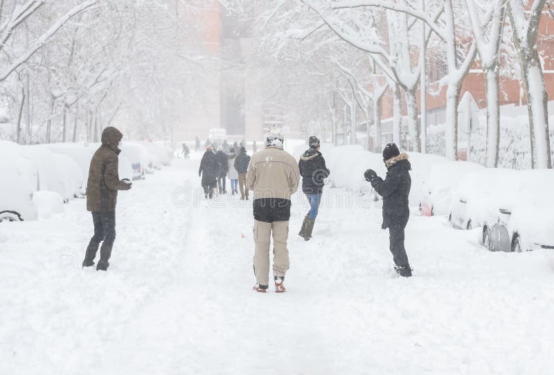 Group of People Playing in a Park Covered with Snow Stock Photo - Image ...