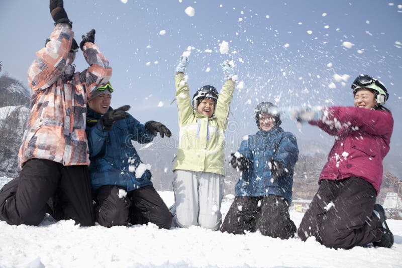 Group of People Playing in the Snow in Ski Resort Stock Photo - Image ...