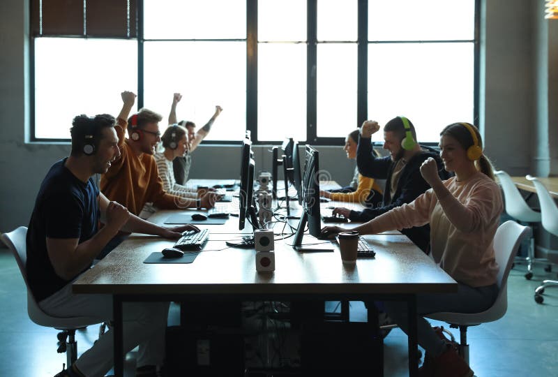 Group of People Playing Video Games in Cafe Stock Photo - Image of cafe ...