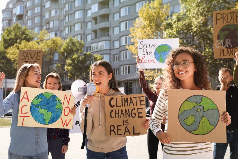 Group of People with Posters Protesting Against Climate Change on City ...