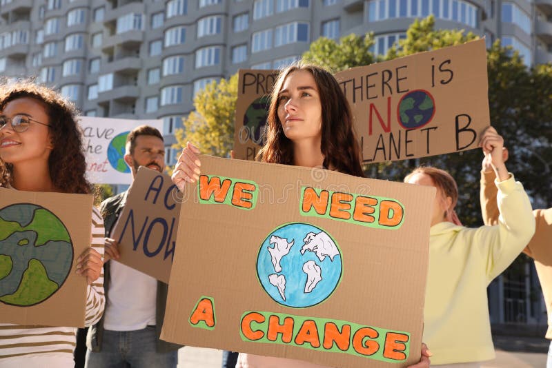 Group of People with Posters Protesting Against Climate Change on City ...