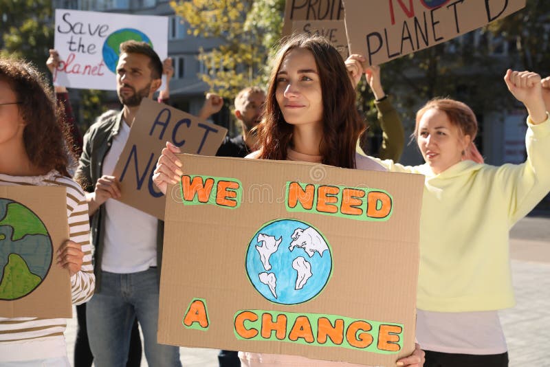 Group of People with Posters Protesting Against Climate Change on City ...