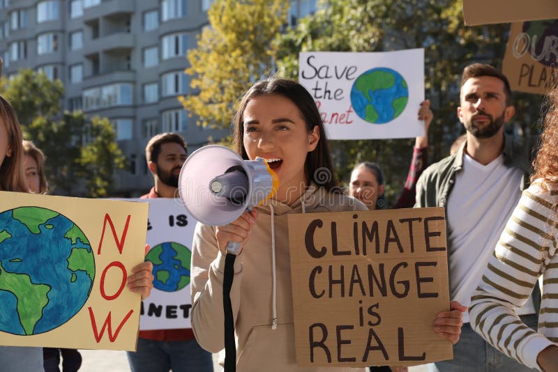 Group of People with Posters Protesting Against Climate Change on City ...