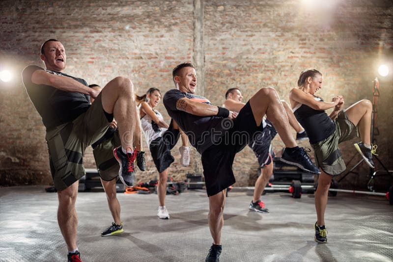 Group of People Practicing Kick Stock Image - Image of kicks, danger ...