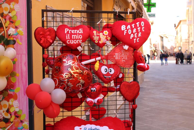 A Group of People Riding on the Back of a Red Building Editorial Photo ...