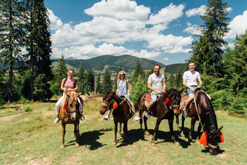 Group Of People Riding Horses Stock Image - Image of park, meadow ...