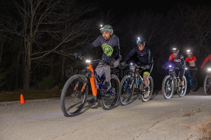 Group of People Riding Mountain Bikes at Night. Texas Editorial Stock ...
