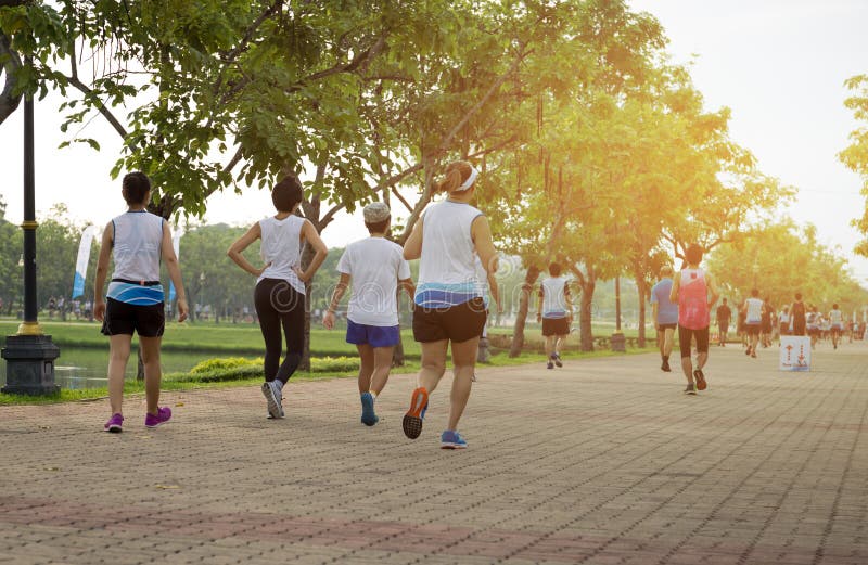 Group of People Running Marathon in the Park Editorial Photo - Image of ...