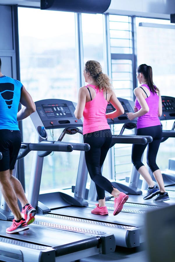 Group of People Running on Treadmills Stock Photo - Image of cardio ...