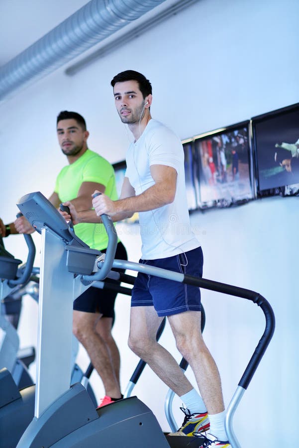Group of People Running on Treadmills Stock Photo - Image of female ...