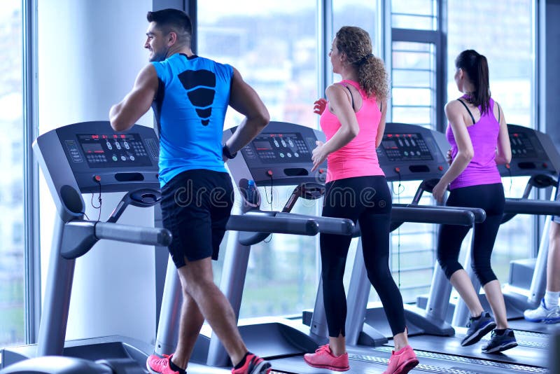 Group of People Running on Treadmills Stock Photo - Image of modern ...