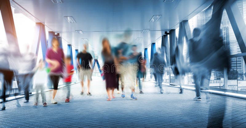 People Rushing in Office Lobby with Motion Blur Stock Photo - Image of ...