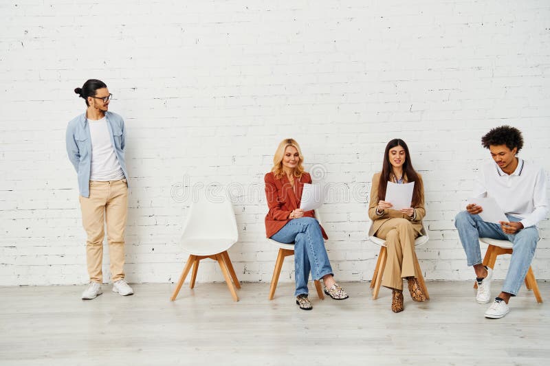 A Group of People Seated in Stock Photo - Image of chairs ...