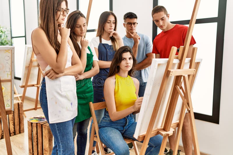Group of People with Serious Expression Looking Draw of Partner at Art ...