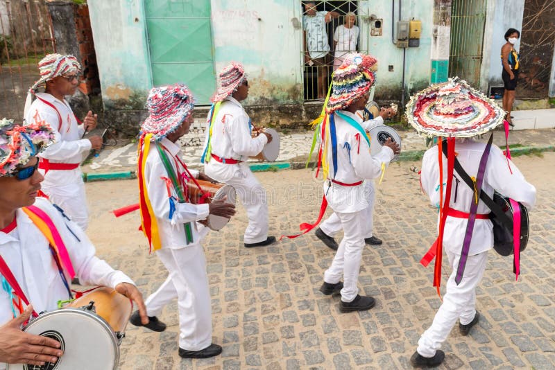 Group of People Singing and Dancing during a Parade on the Streets of ...