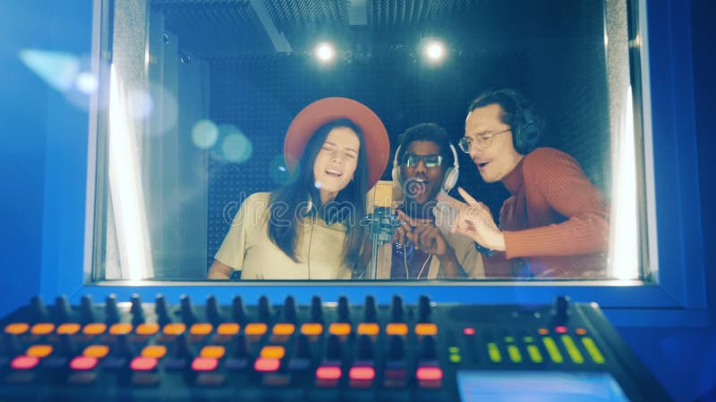 Friends, Group of People Singing in the Studio Booth and Being Recorded ...