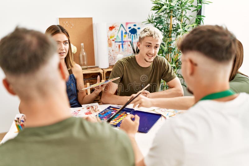Group of People Sitting on the Table Drawing at Art Studio Stock Photo ...