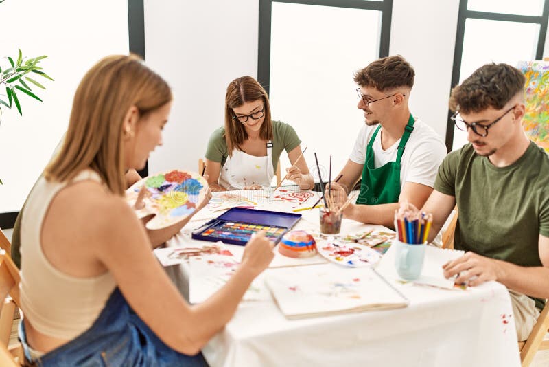 Group of People Sitting on the Table Drawing at Art Studio Stock Photo ...