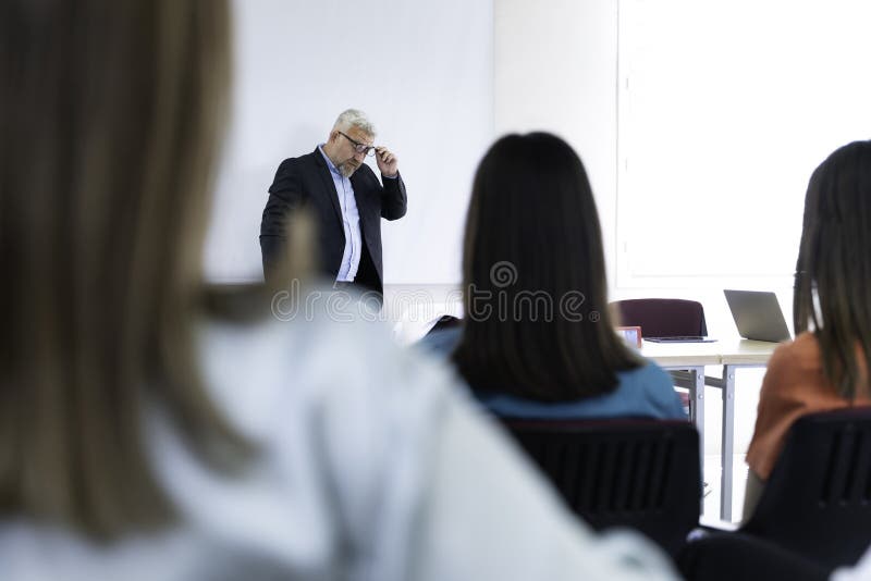 Group of Doctors and Nurses Working Together in a Conference Room at ...