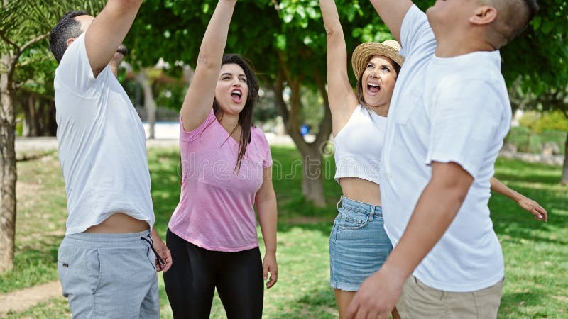 Group of People Smiling Confident Doing Unity Gesture at Park Stock ...