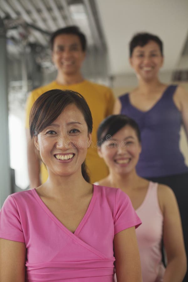 Group of People Smiling and Exercising in the Gym, Portrait Stock Photo ...