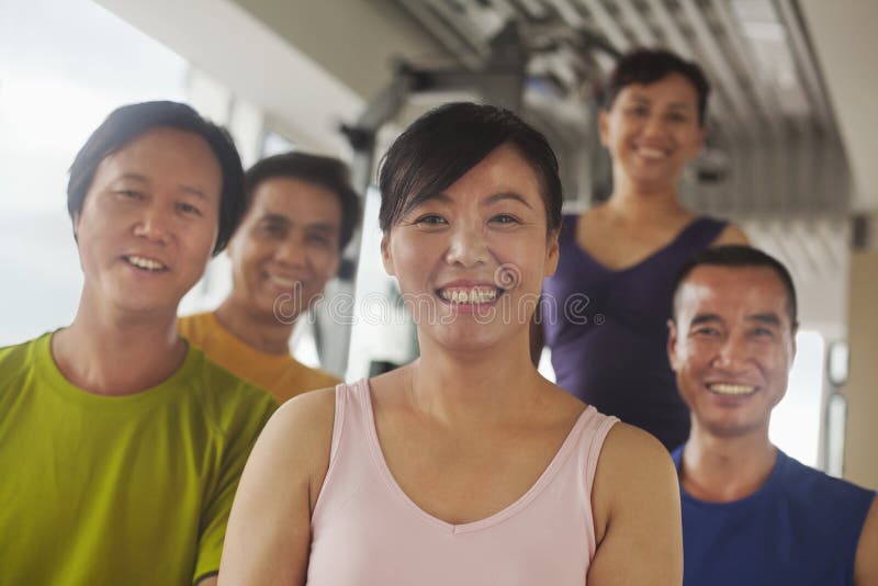 Group of People Smiling and Exercising in the Gym, Portrait Stock Photo ...