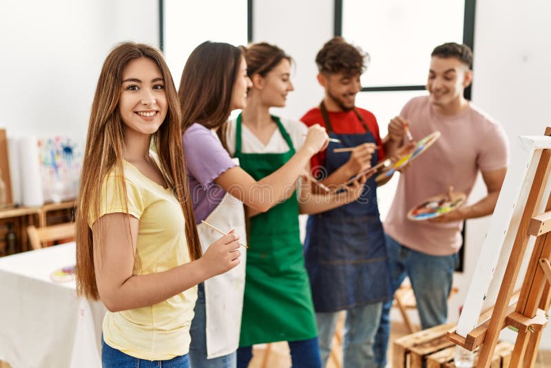 Group of People Smiling Happy Drawing on Canvas Standing at Art Studio ...