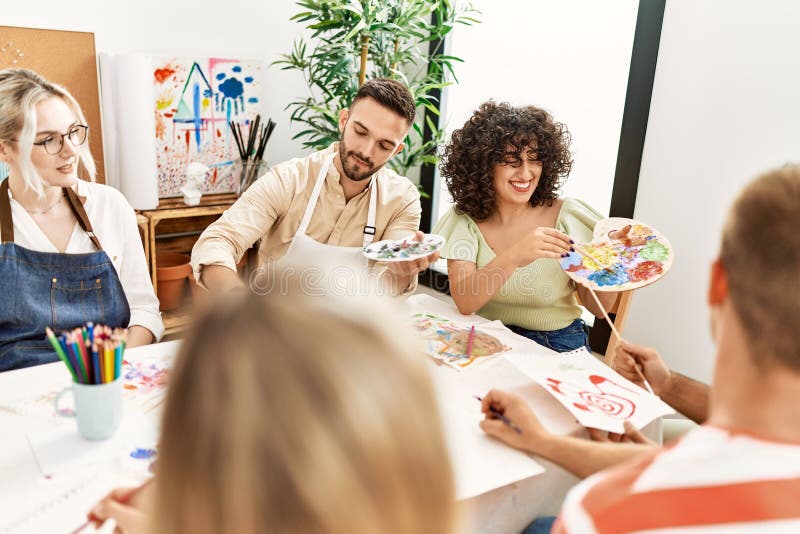 Group of People Smiling Happy Drawing Sitting on the Table at Art ...