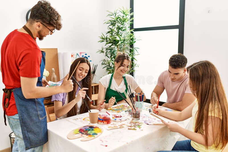 Group of People Smiling Happy Drawing Sitting on the Table at Art ...