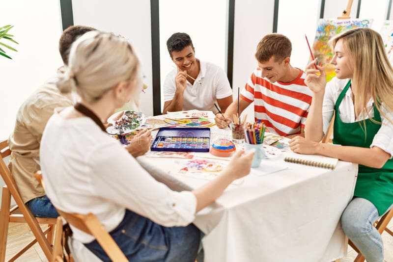 Group of People Smiling Happy Drawing Sitting on the Table at Art ...