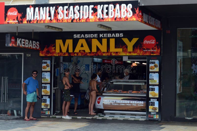 A Group of People Standing in Front of a Kebab Shop in Manly Editorial ...