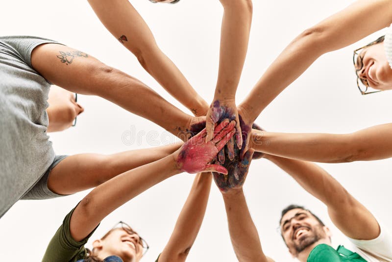Group of People Standing with United Hands at Art Studio Stock Photo ...