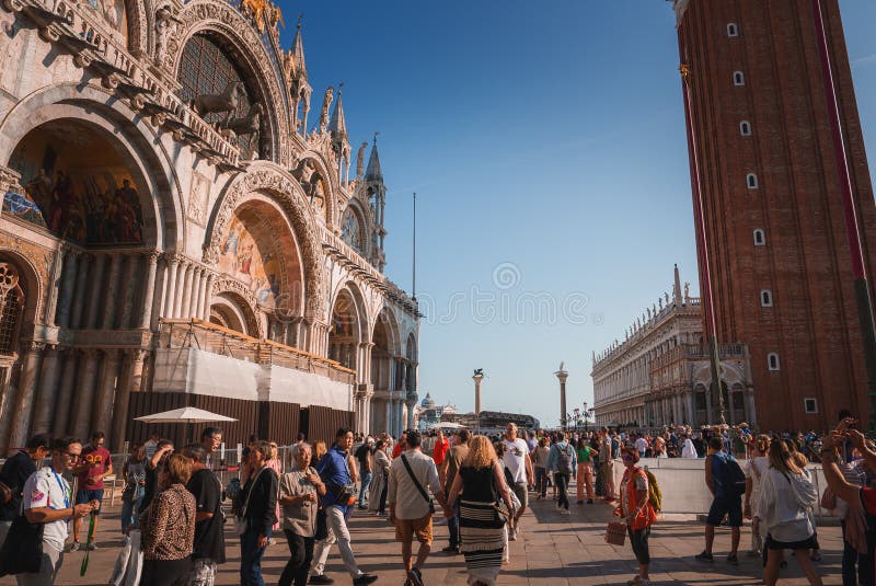 A Group of People Stands in Front of the St. Marks Basilica Cathedral ...