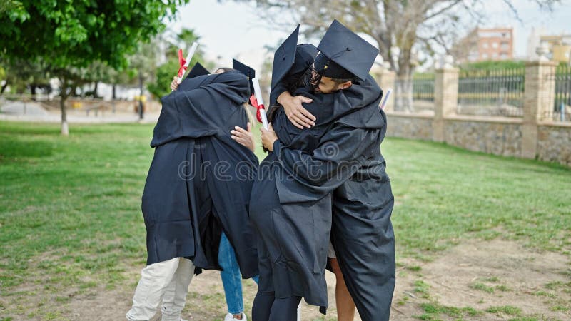 Group of People Students Graduated Holding Diploma Hugging Each Other ...
