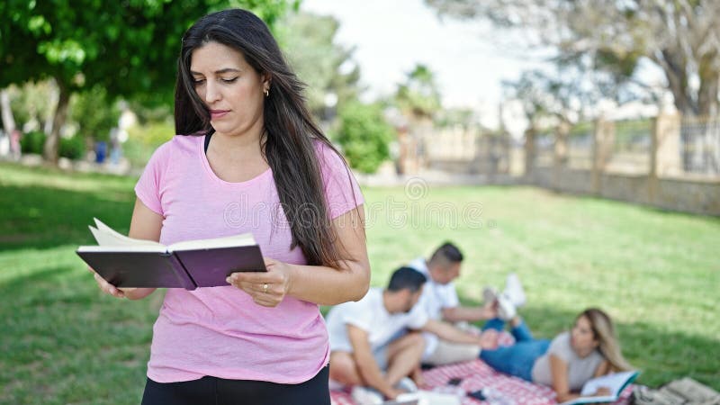 Group of People Students Reading Book Standing at Park Stock Photo ...