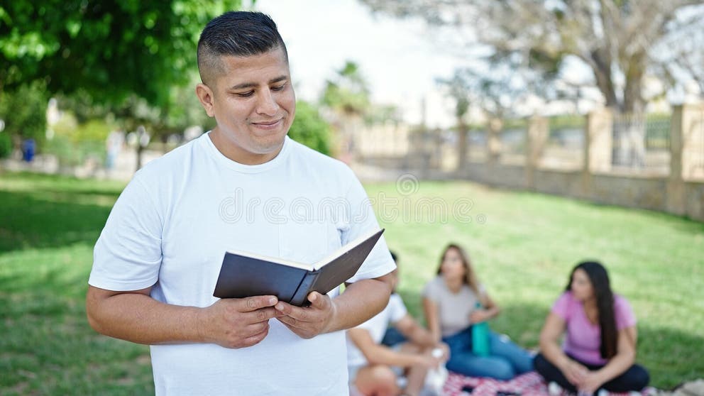 Group of People Students Reciting Book Standing at Park Stock Photo ...