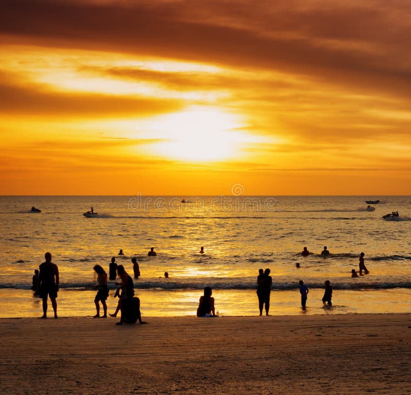 Group of People on Sunset Beach Stock Photo - Image of people, adults ...