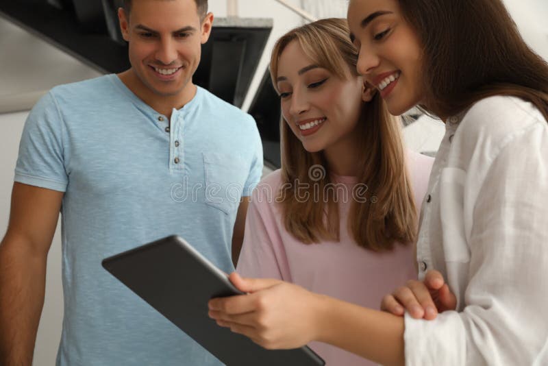 Group of People with Tablet Talking in Hall Stock Image - Image of male ...