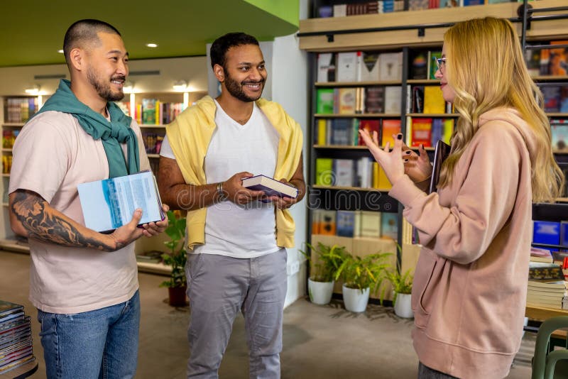 Group of People Talking in the Library Stock Photo - Image of ...
