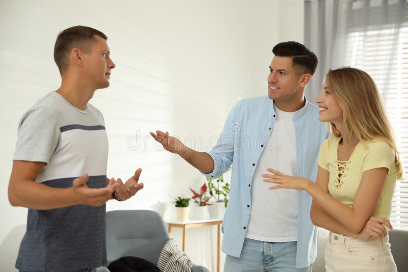 Group of People Talking in Living Room Stock Image - Image of family ...