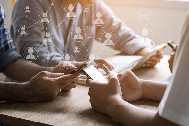 Group of People Use Phone on Wood Table for Connect and Communicate ...