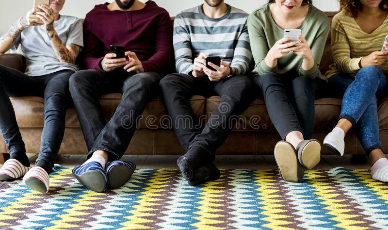 Group of People Using Mobile Phone on Couch Stock Photo - Image of ...