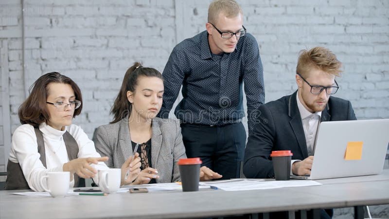 Group of People Using Modern Computer and Making Brainstorming R Stock ...