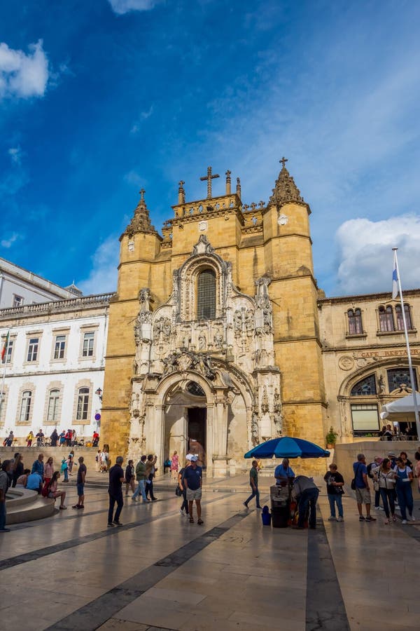 Group of People are Walking in Front of the Monastery of the Holy Cross ...