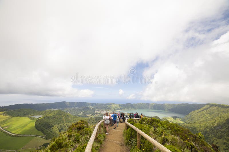 A Group of People are Walking on a Path Up a Mountain Stock Image ...